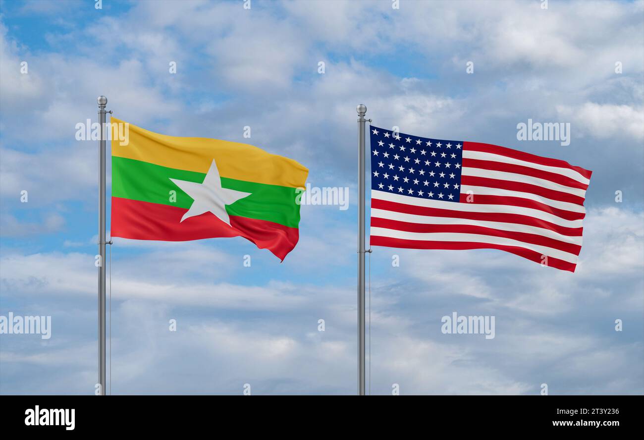 USA and Myanmar flags waving together in the wind on blue cloudy sky ...