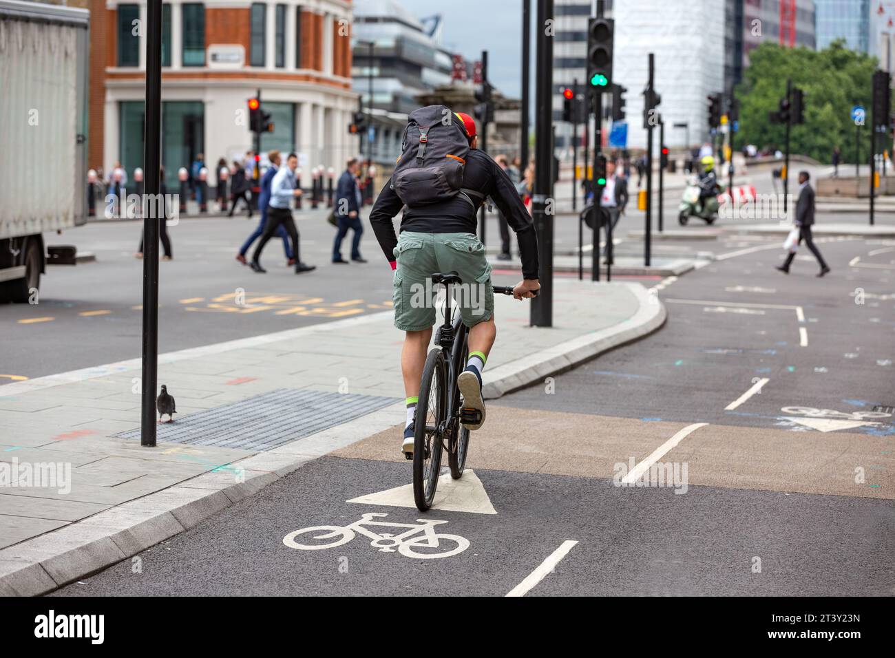 Sporty cyclist on a separate cycle path in London Stock Photo - Alamy