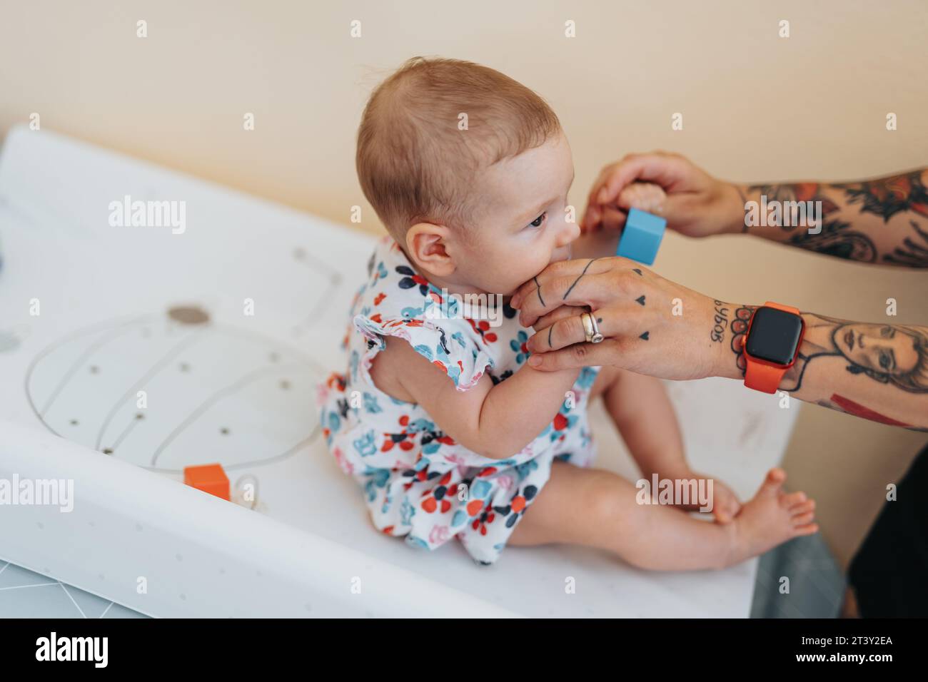 Mom with baby daughter in hospital, waiting for medical check up. Baby ...