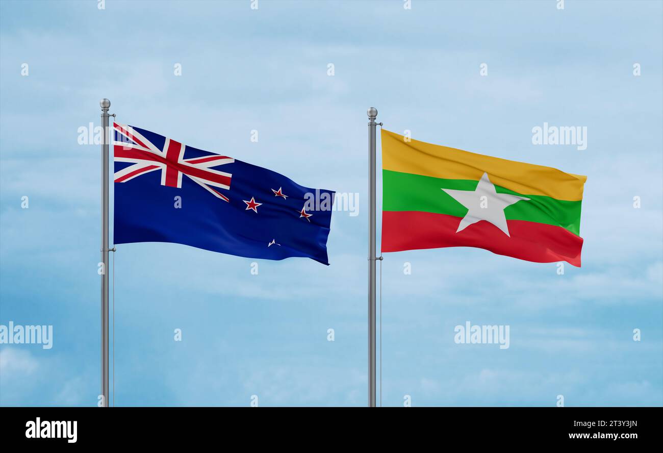 Myanmar aka Burma and New Zealand flags waving together on blue cloudy sky, two country ...