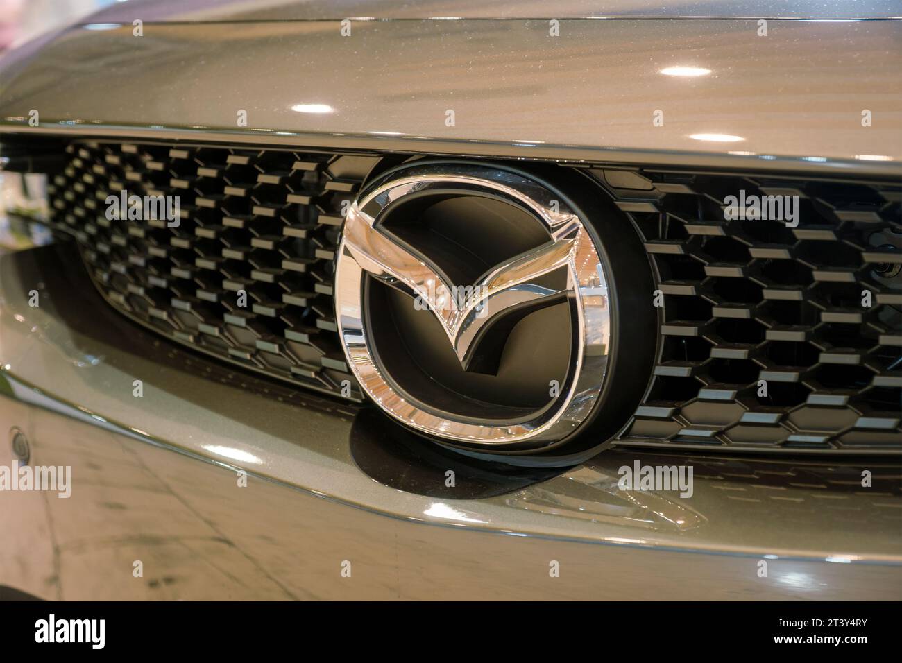 Mazda car logo emblem close up Stock Photo - Alamy