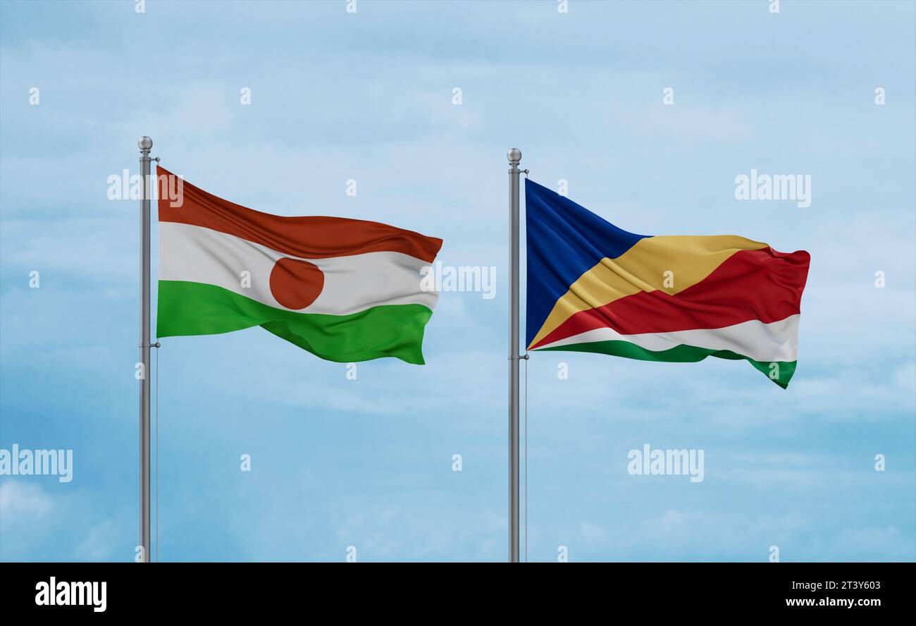 Seychelles and Niger flags waving together in the wind on blue cloudy sky, two country ...