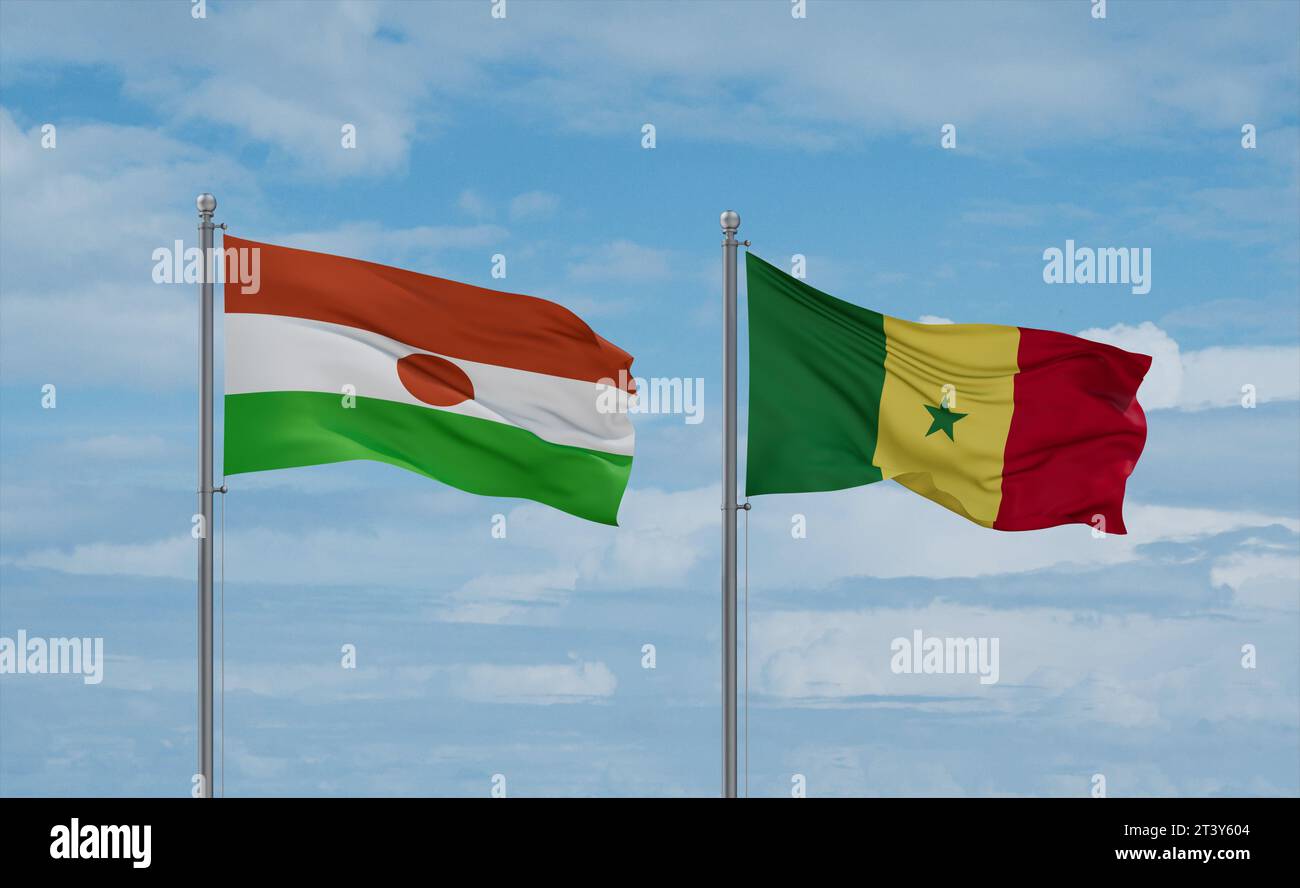 Republic of Senegal and Niger flags waving together in the wind on blue ...