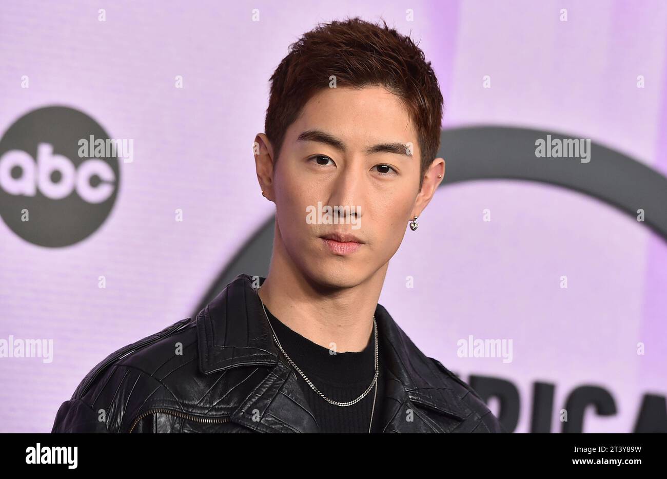 FILE - K-pop musician Mark Tuan arrives at the American Music Awards in ...
