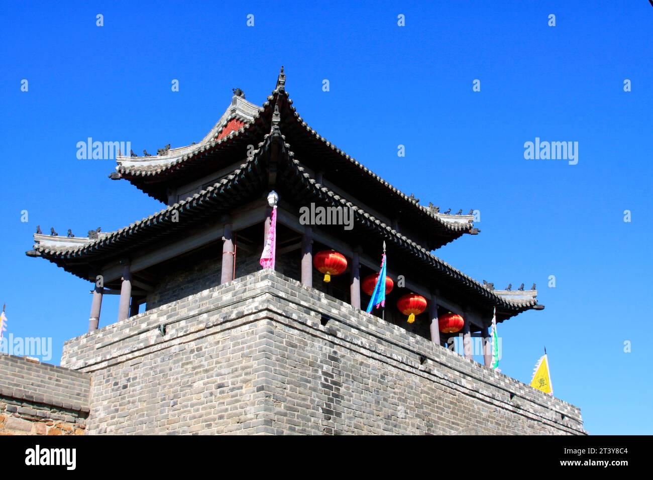 tower over a city gate, ancient Chinese style in a scenic spot, china ...