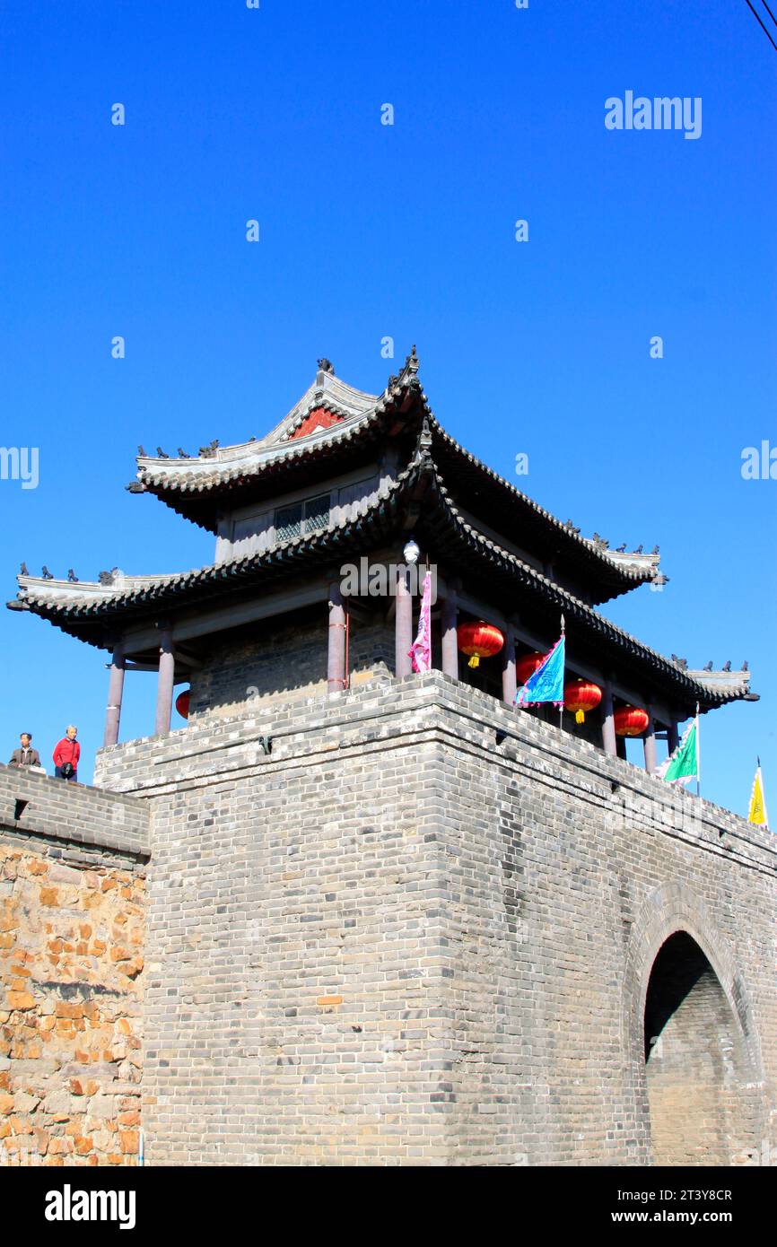 tower over a city gate, ancient Chinese style in a scenic spot, china ...