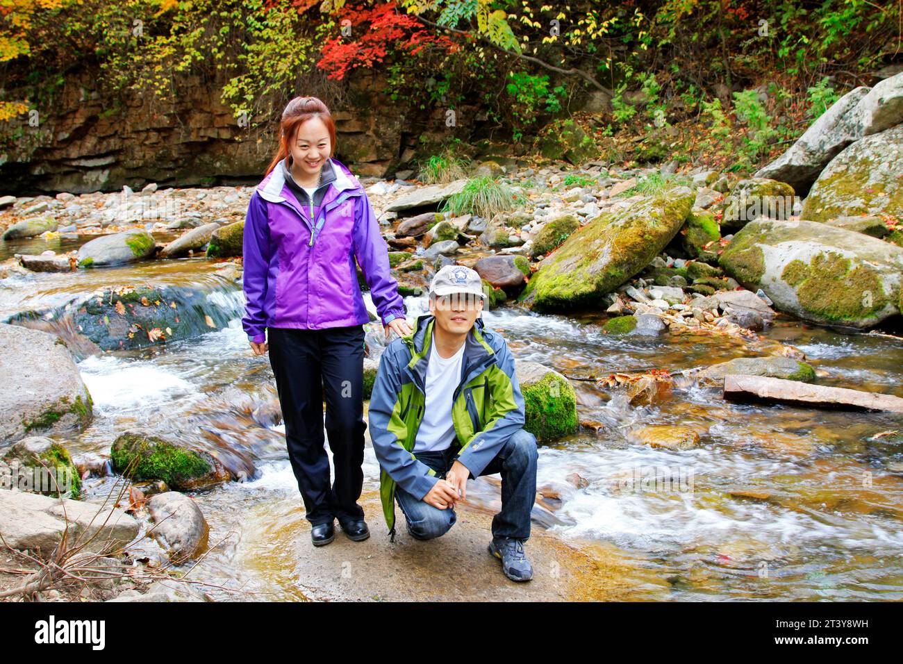 BENXI - OCTOBER 4: Female tourist poses for photos in a scenic area on ...
