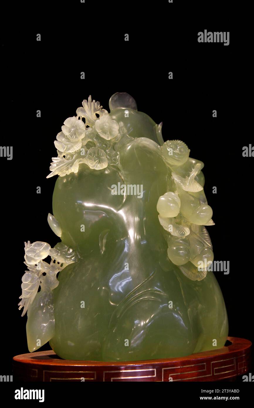 Jade carvings works on a black background Stock Photo - Alamy