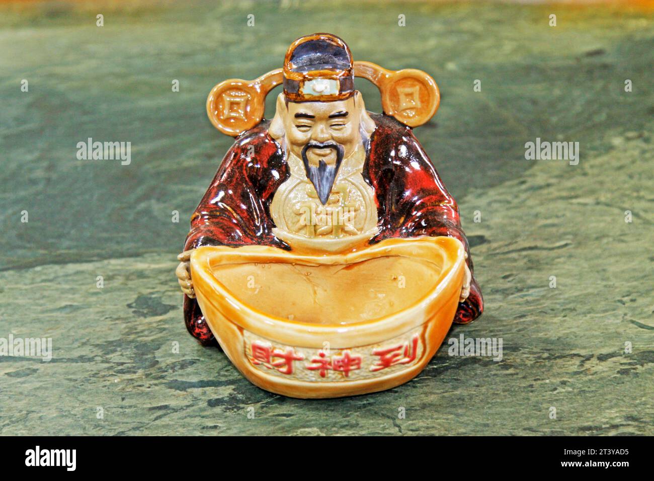 god of wealth ceramic sculpture, Chinese traditional style Stock Photo ...