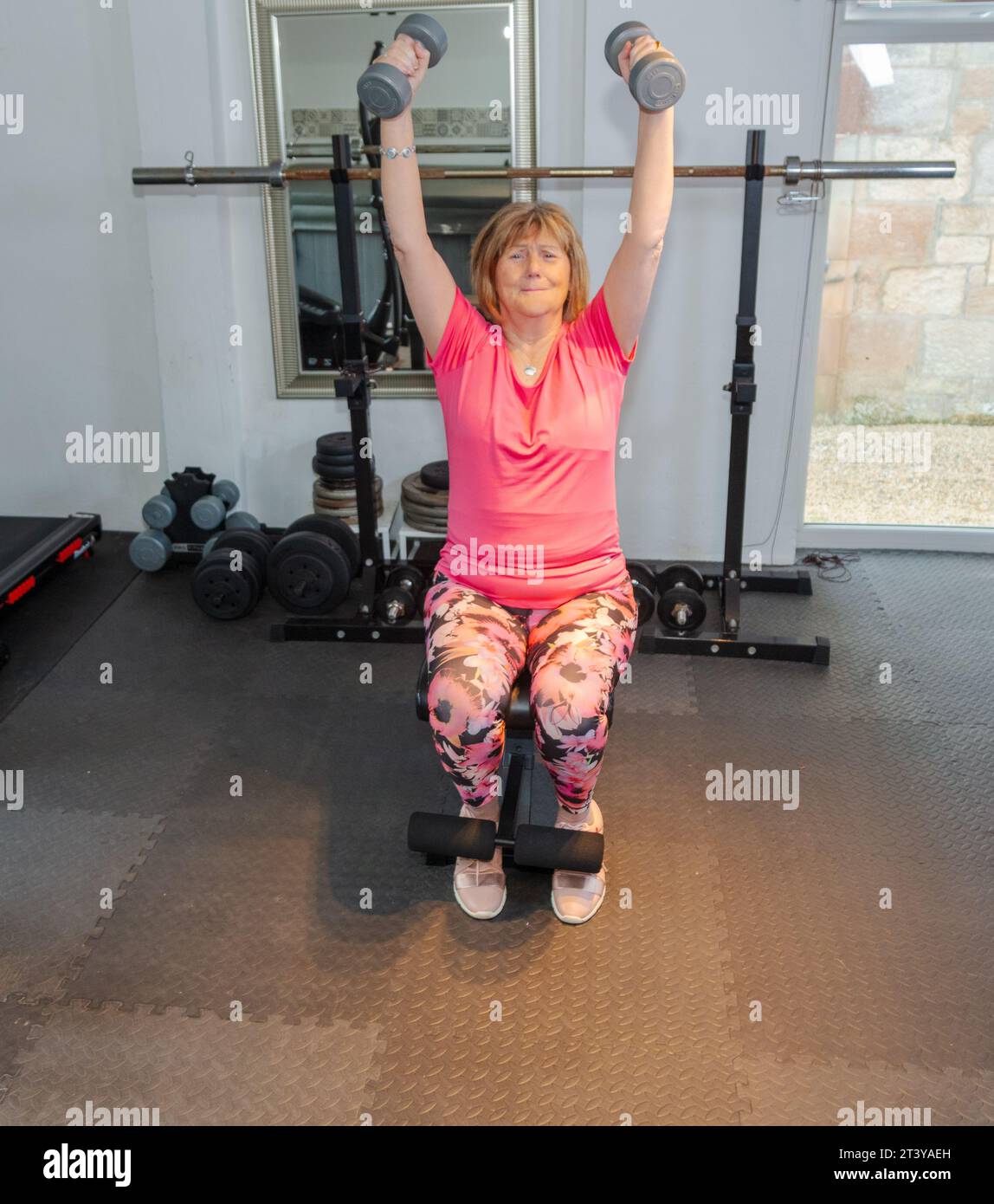 Fit senior woman over 60 works out at the gym Stock Photo - Alamy