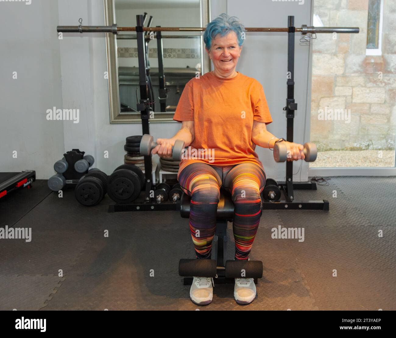 Fit senior woman over 60 works out at the gym Stock Photo - Alamy