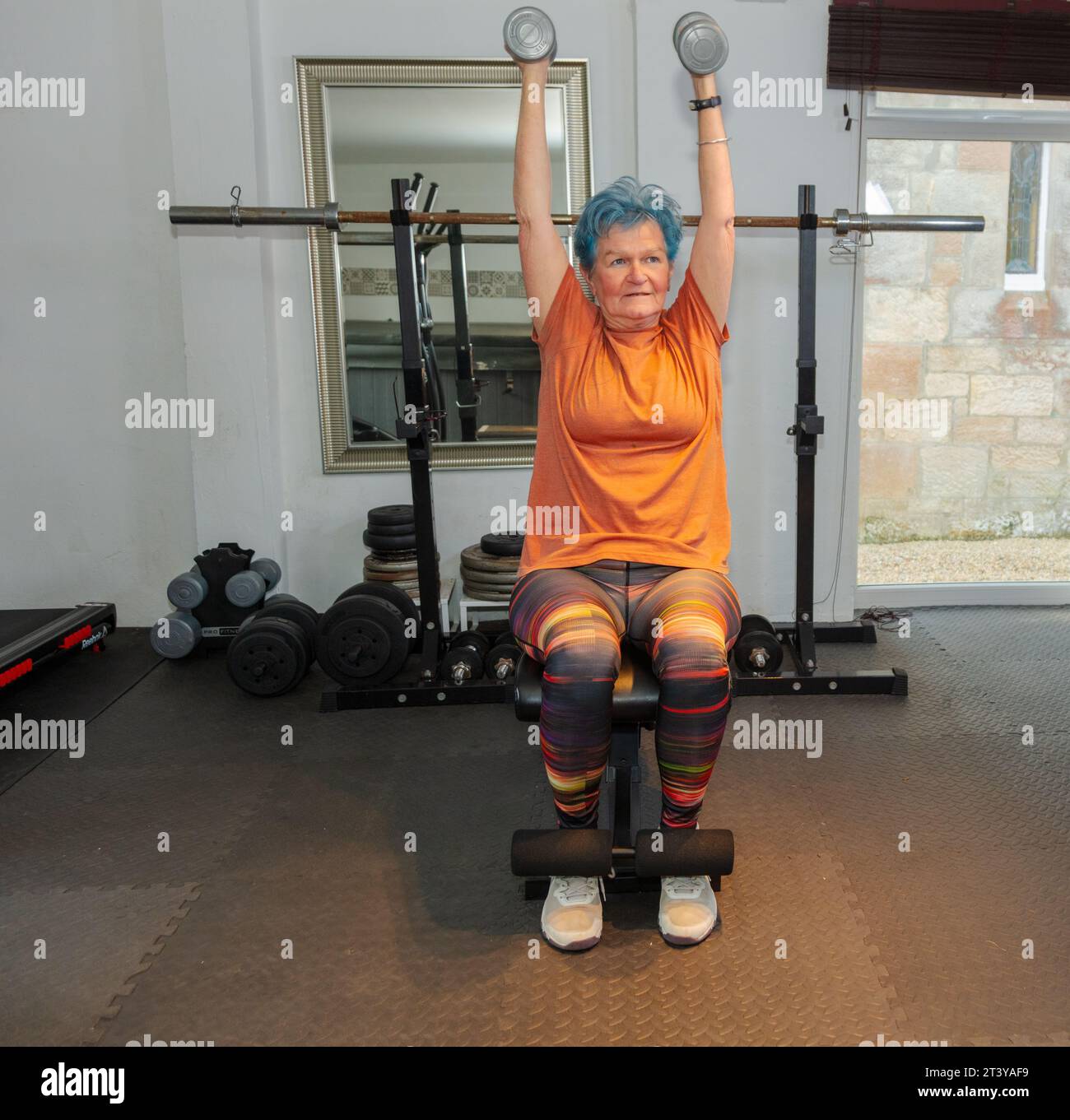 Fit senior woman over 60 works out at the gym Stock Photo - Alamy