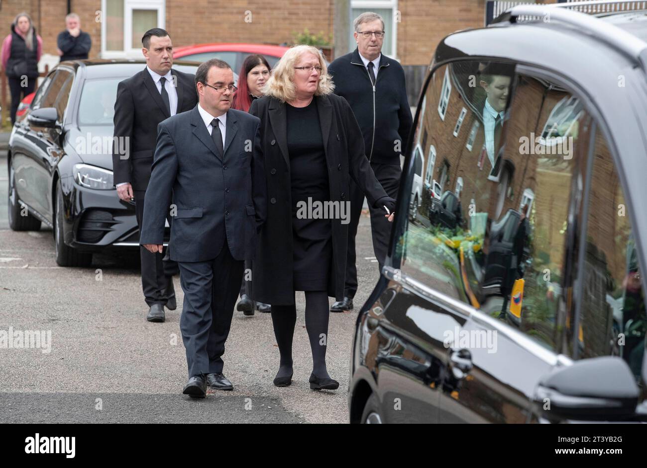 Sarah and Sean Baker, the parents of Jessica Baker, walk behind the ...