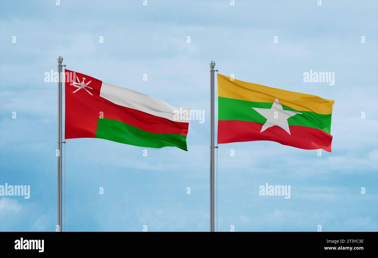 Myanmar aka Burma and Oman flags waving together on blue cloudy sky ...