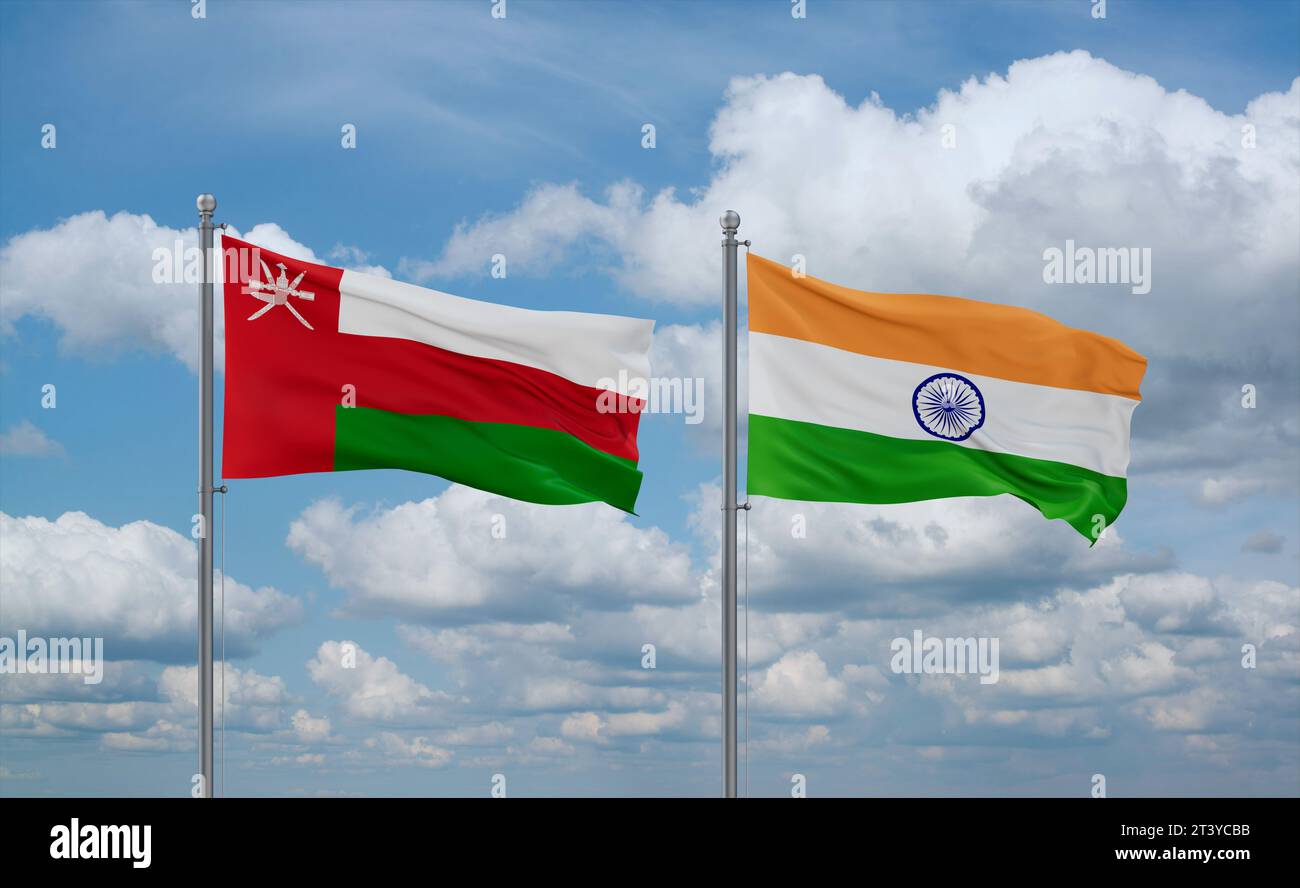 India and Oman flags waving together on blue cloudy sky, two country ...