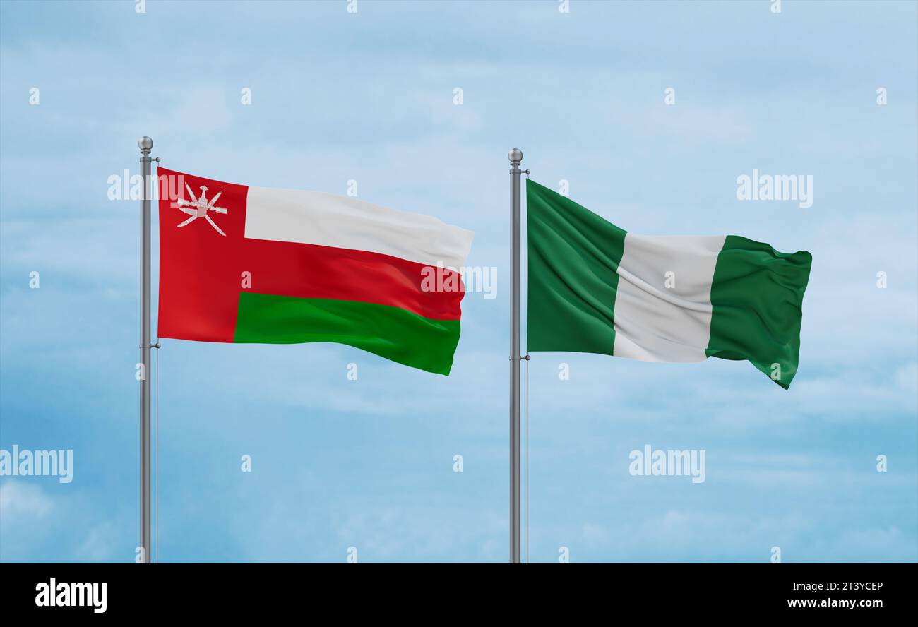 Nigeria and Oman flags waving together on blue cloudy sky, two country ...