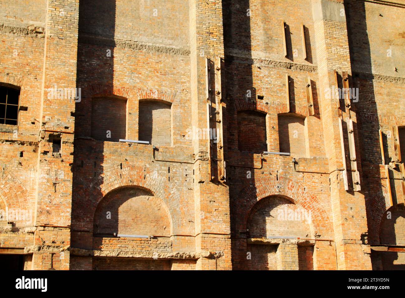 broken wall in a factory, closeup of photo Stock Photo - Alamy