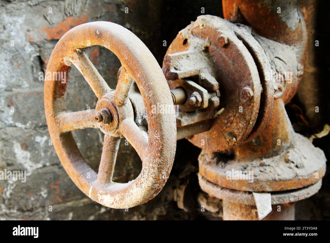 abandoned dirty pipe valve in a factory Stock Photo - Alamy