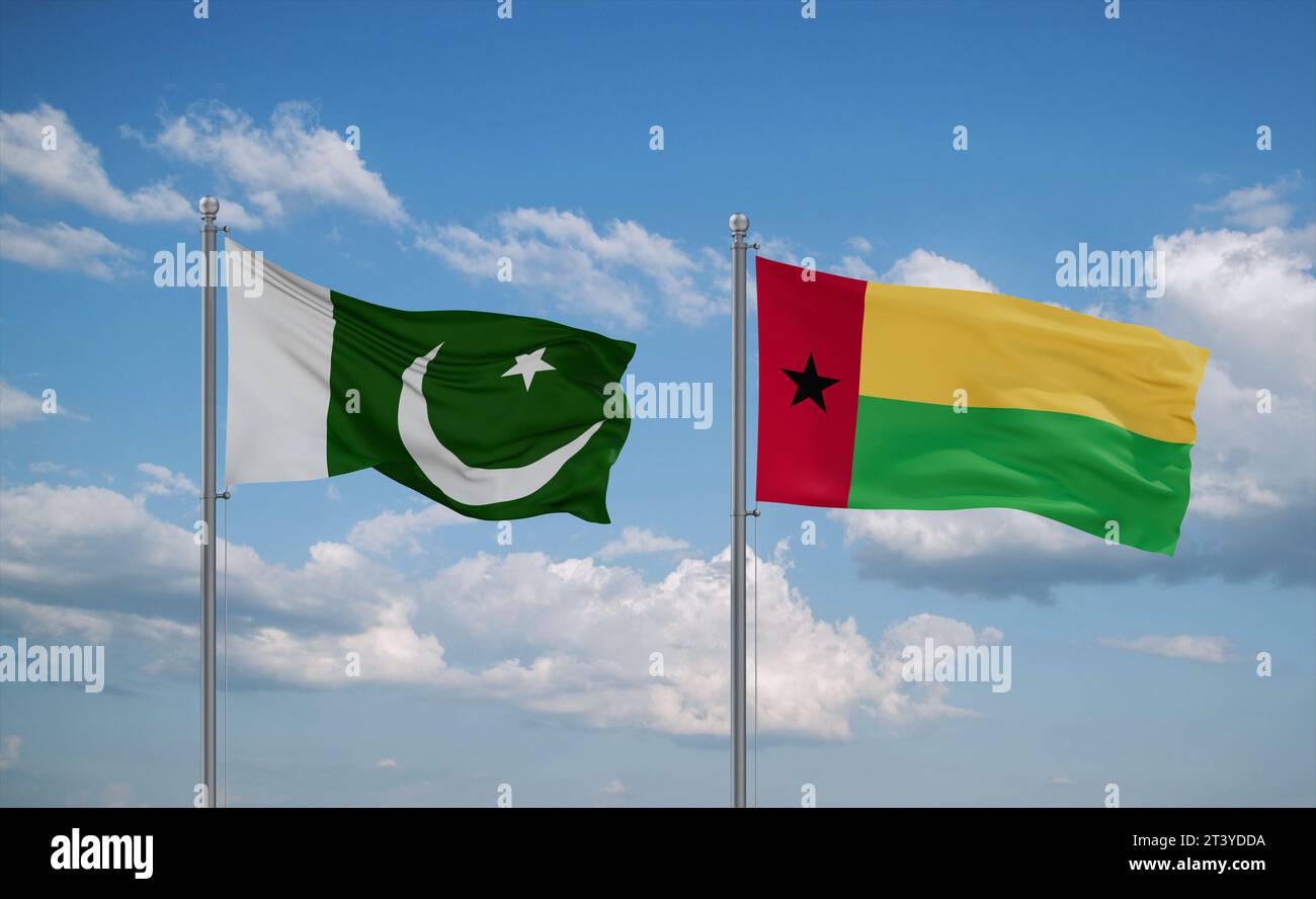 Guinea-Bissau and Pakistan flags waving together on blue cloudy sky ...