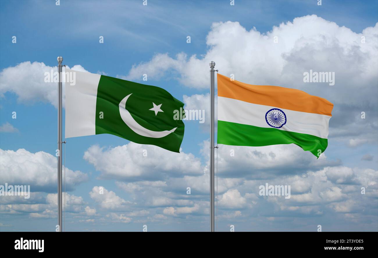 India and Pakistan flags waving together on blue cloudy sky, two ...