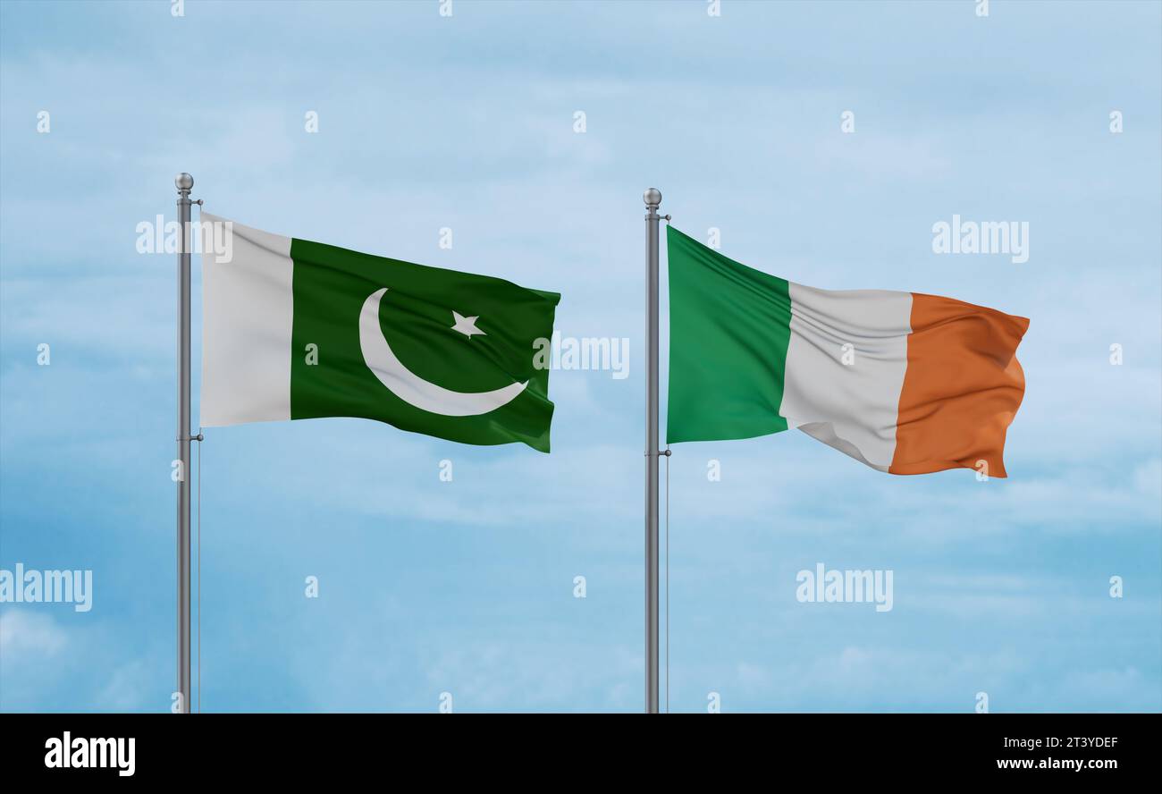 Ireland and Pakistan flags waving together in the wind on blue cloudy ...