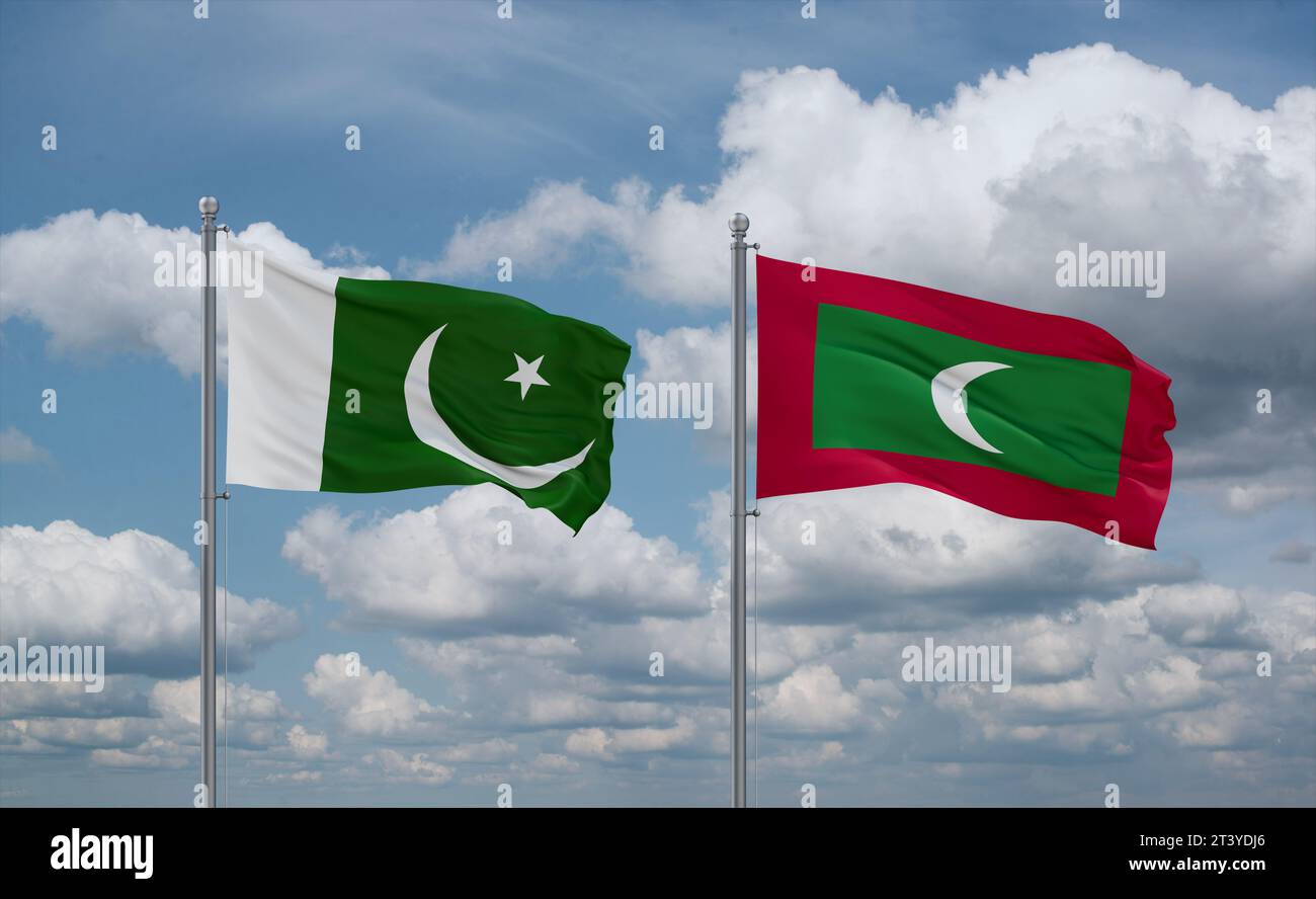 Maldives and Pakistan flags waving together on blue cloudy sky, two country relationship concept ...