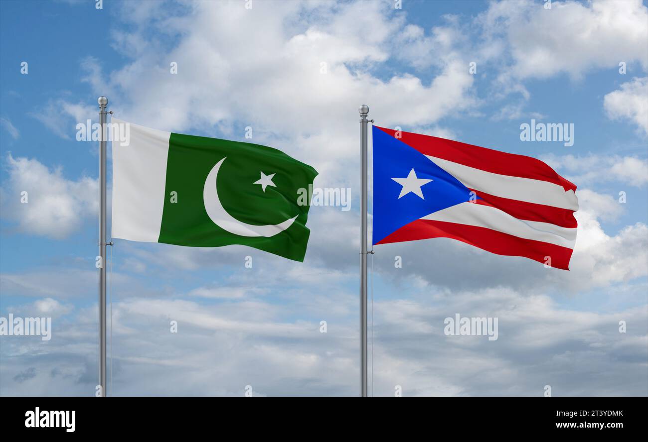 Puerto Rico and Pakistan flags waving together in the wind on blue ...
