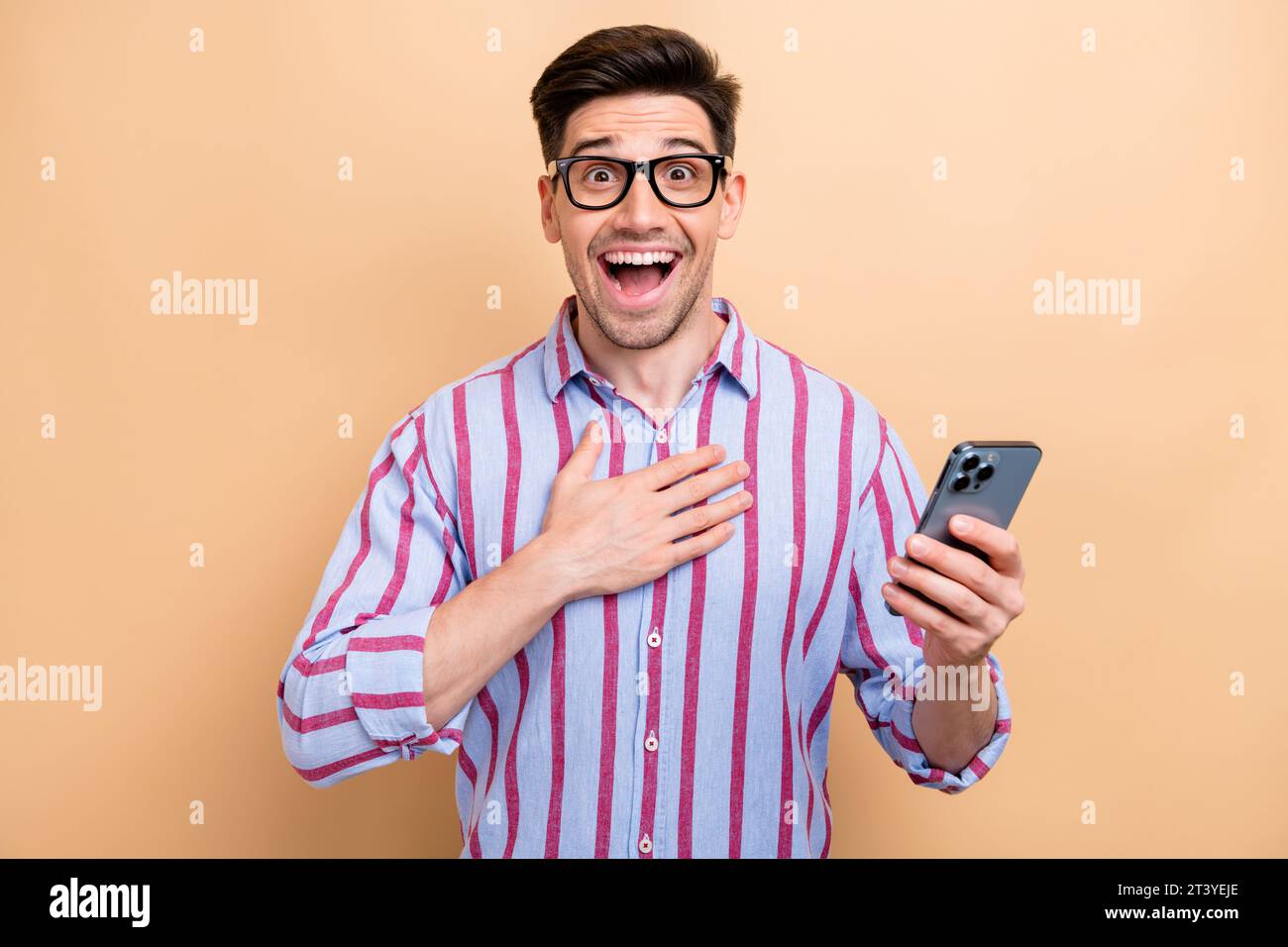 Photo young shocked guy unexpected reaction put hand on heart surprised ...