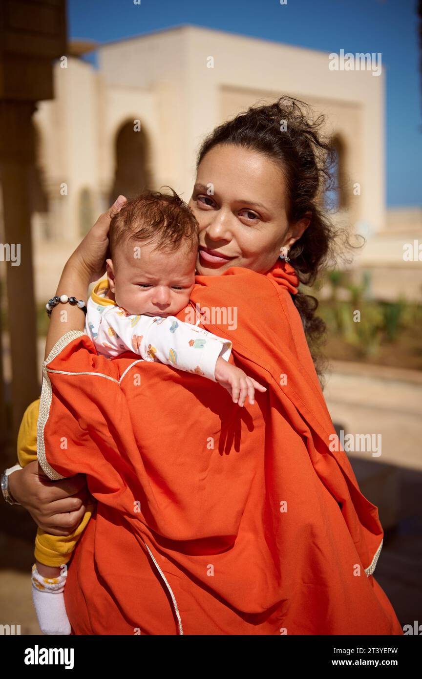 Portrait of a beautiful Middle Eastern woman, loving mother in Oriental ...