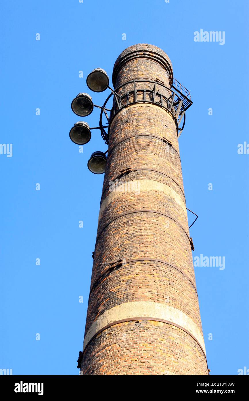 big chimney equipped with shoot lights in a factory Stock Photo - Alamy