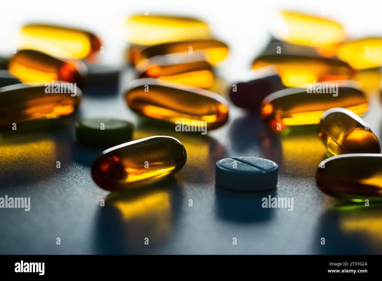 Close up of transparent tablets and pills in the shine through ...