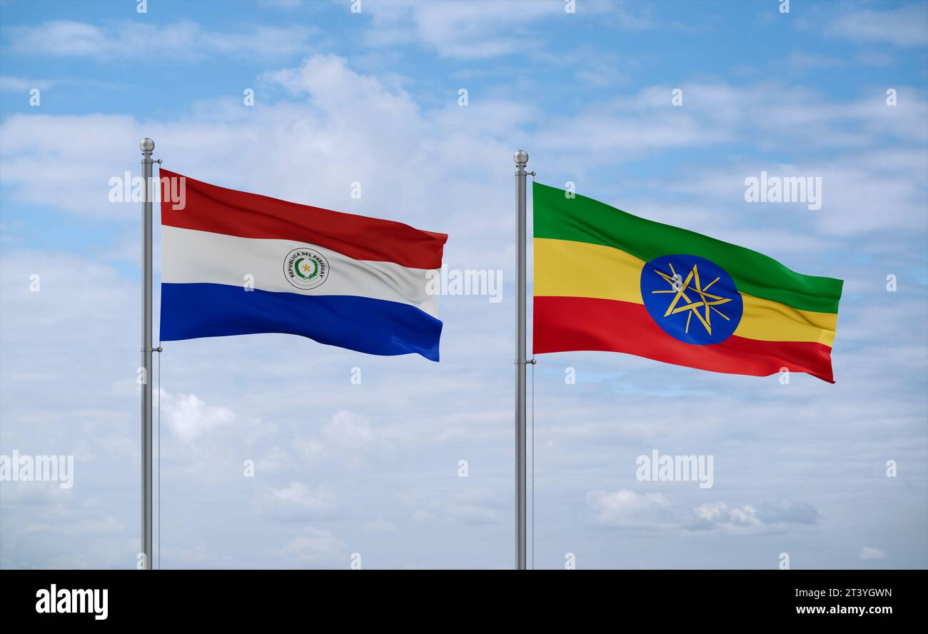 Ethiopia and Paraguay flags waving together on blue cloudy sky, two country relationship concept ...