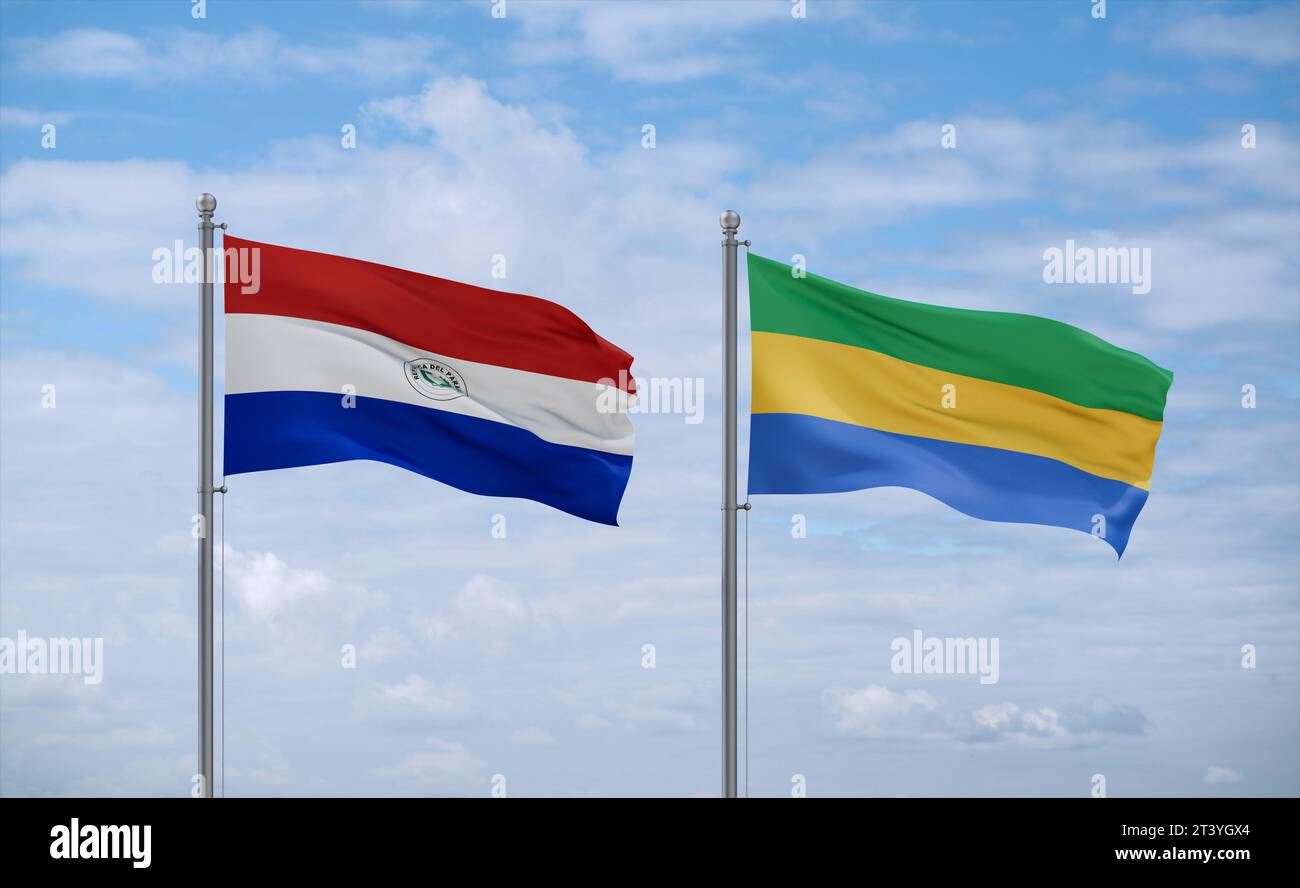 Gabon and Paraguay flags waving together on blue cloudy sky, two country relationship concept ...
