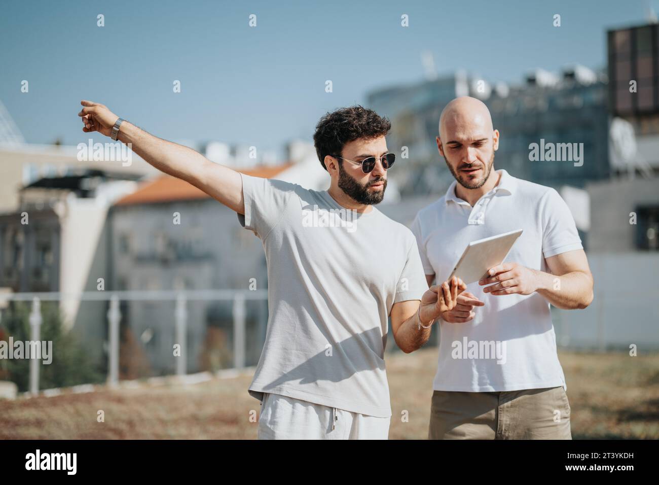 Successful Architects Discussing Modern Building Design Outdoors Stock ...