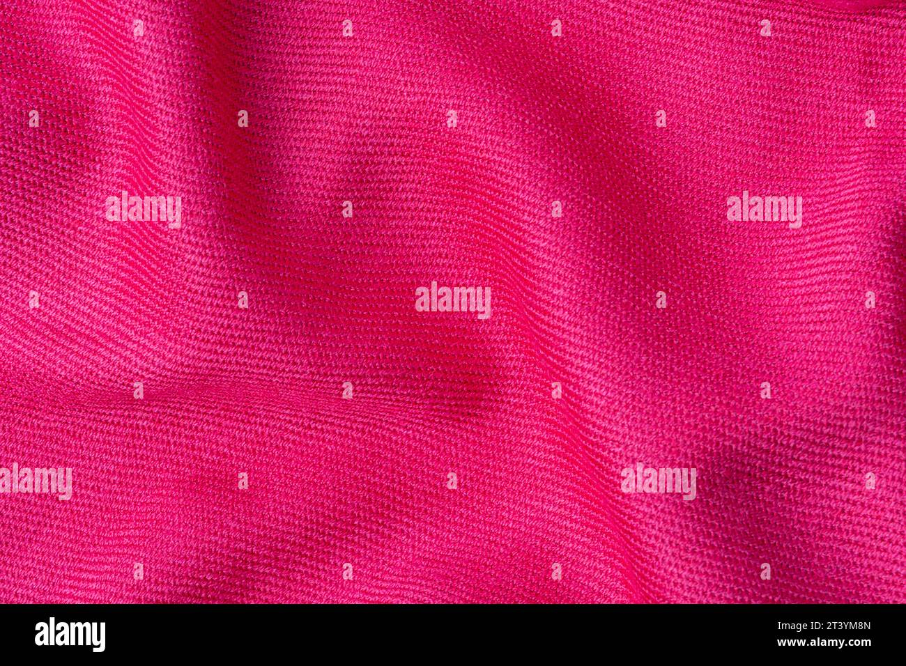 wrinkled pink fabric texture background close-up Stock Photo - Alamy