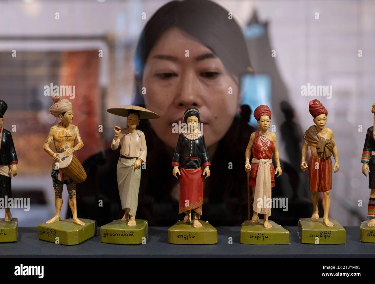 Wooden models of ethnic peoples hi-res stock photography and images - Alamy