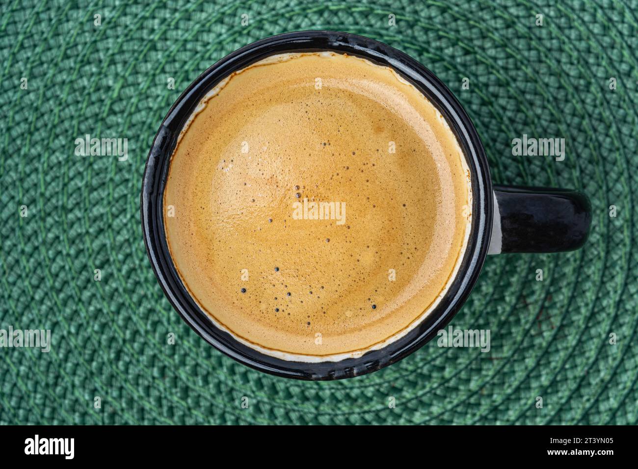 coffee espresso on a green background Stock Photo - Alamy