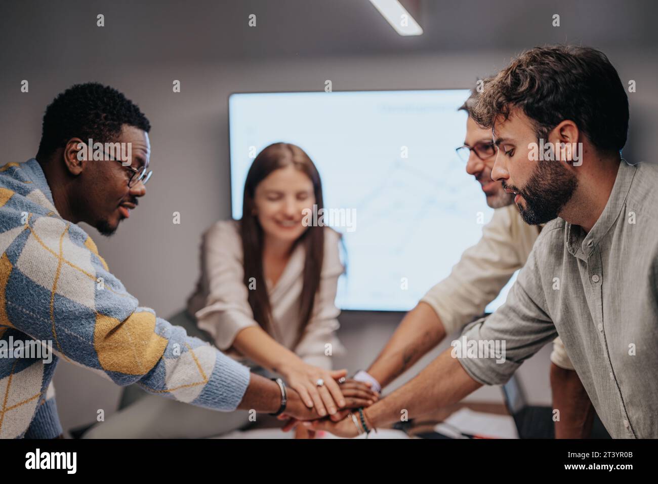 Business Professionals Collaborating on Architectural Plans in Meeting ...