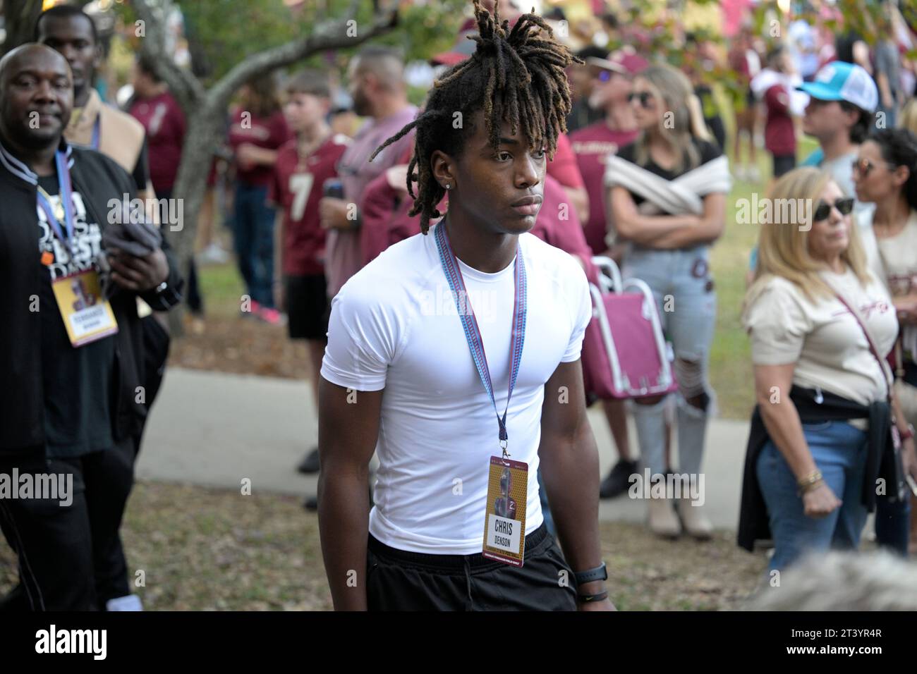 Plant City quarterback Chris Denson walks to the stadium before an NCAA ...