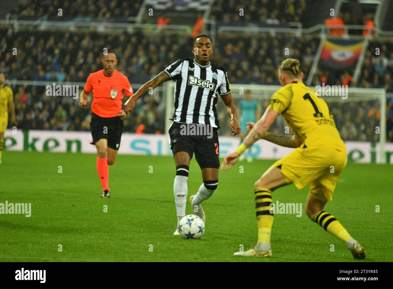 NEWCASTLE upon Tyne, UK. , . Joe Willock, Marius Wolf in action during ...
