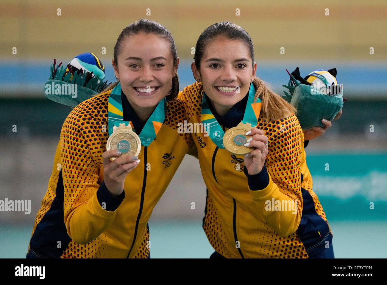 Colombia's Lina Rojas and Lina Hernandez pose with their gold medals at ...