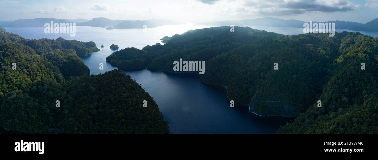 Sunlight reflects off a channel in Alyui Bay, a body of water in Waigeo ...