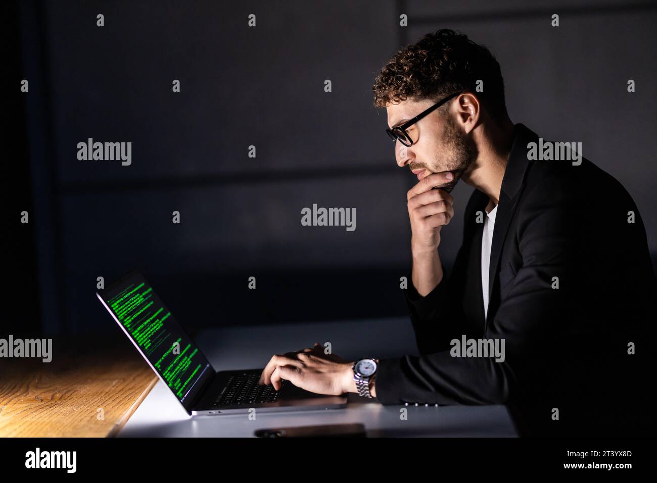 Program development concept. Young man working with computer Stock ...