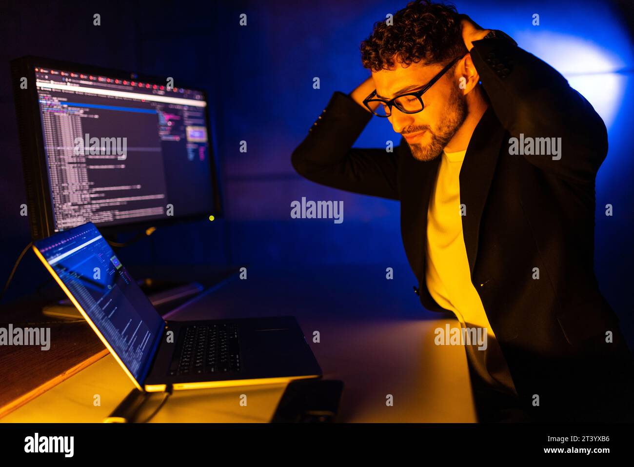 Photo of serious professional programmer look camera improving ...