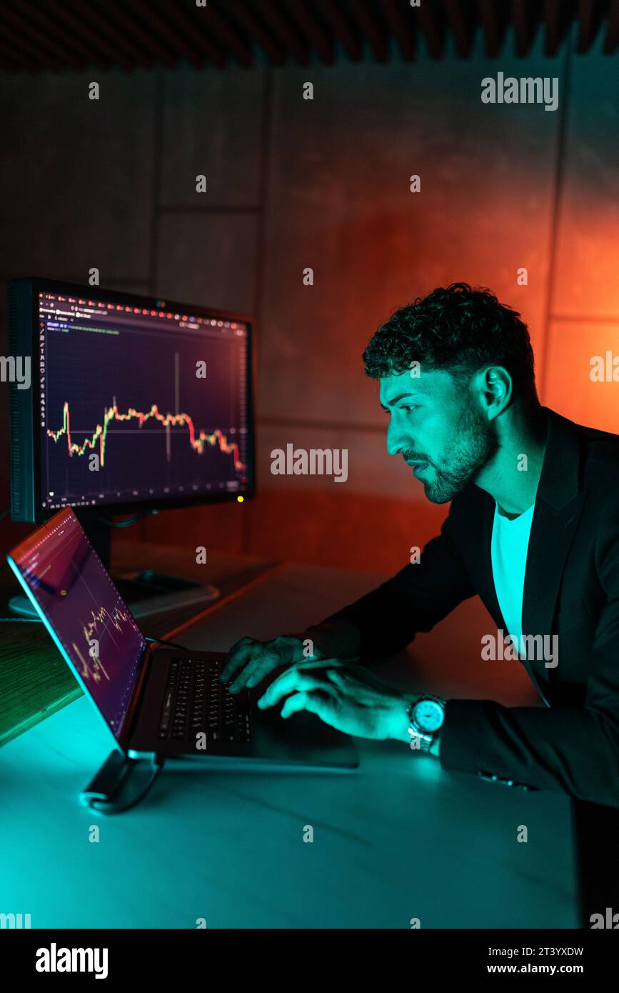 Pensive trader analyzing chart hi-res stock photography and images - Alamy