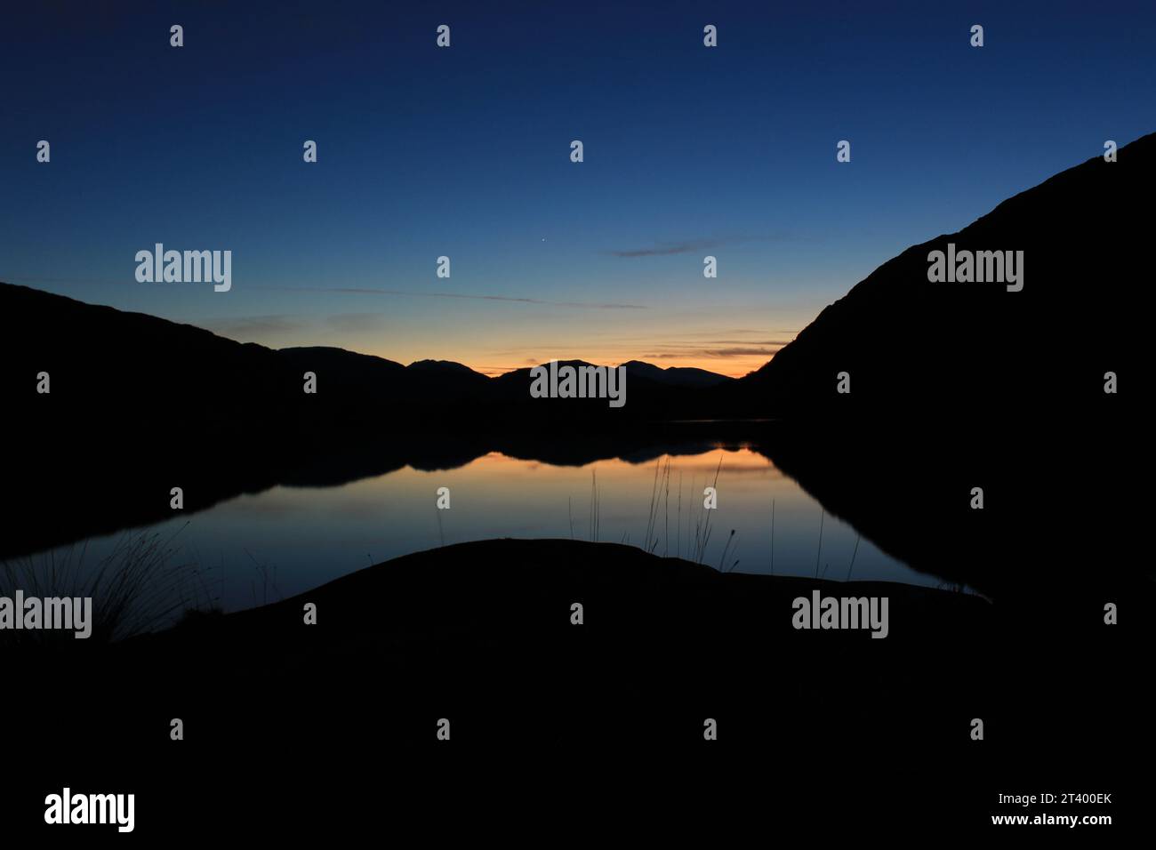 Gorgeous blue hour twilight reflection over the Meeting of the Waters ...