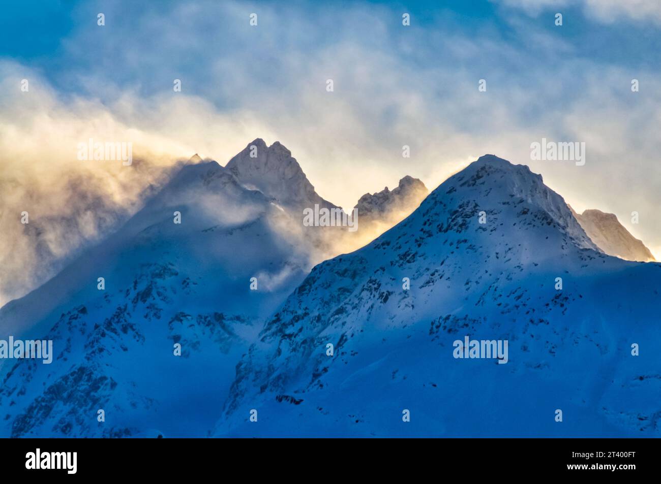 Sunset in the alps around Bormio Stock Photo - Alamy