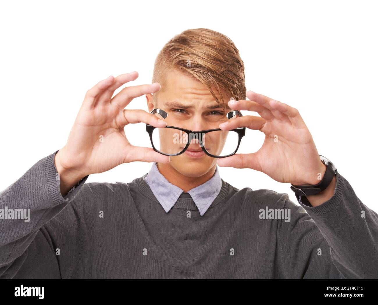 Young man squinting one eye hi-res stock photography and images - Alamy