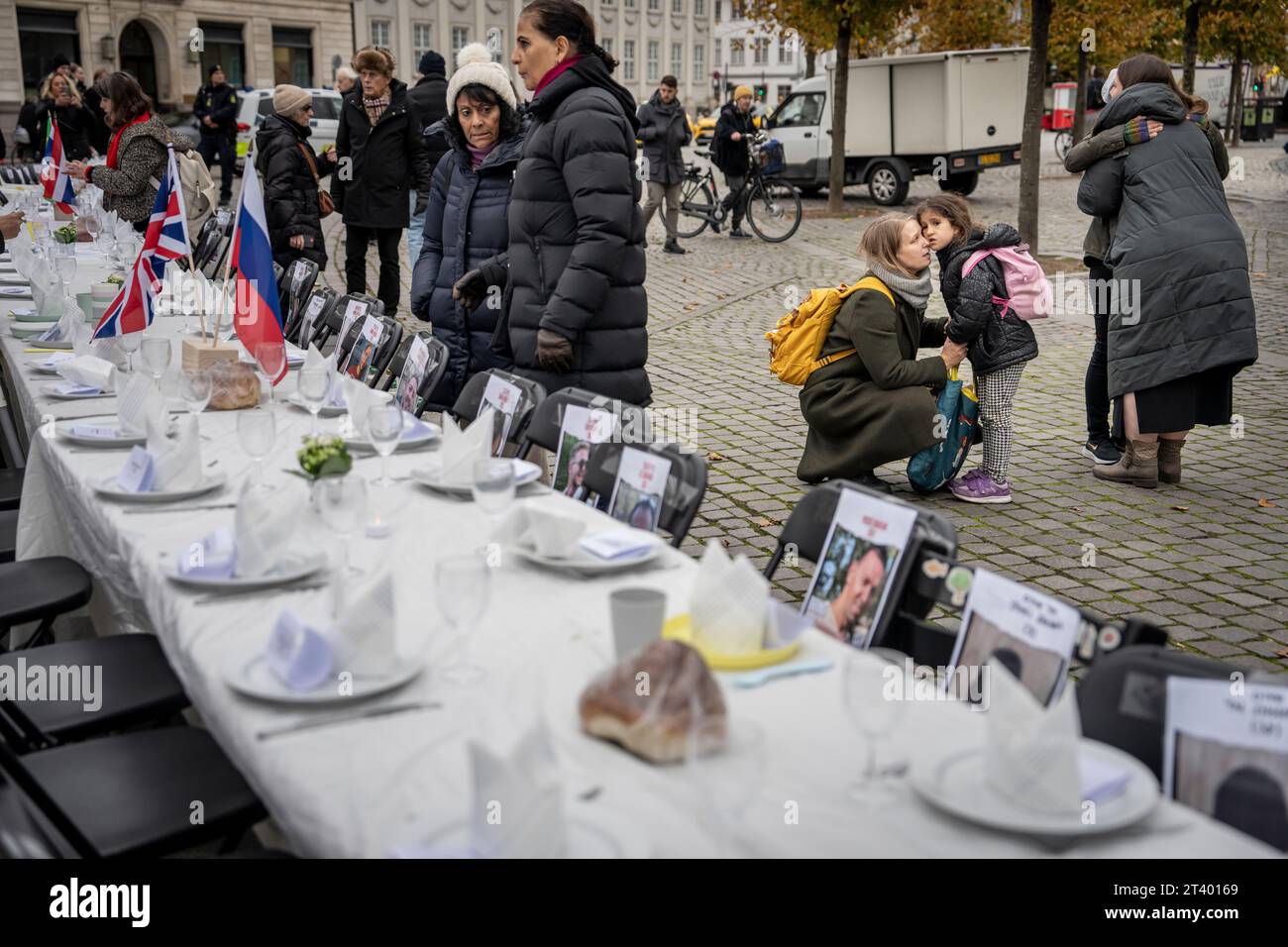 A Shabbat table for the 222 hostages trapped in Gaza is set up with a ...