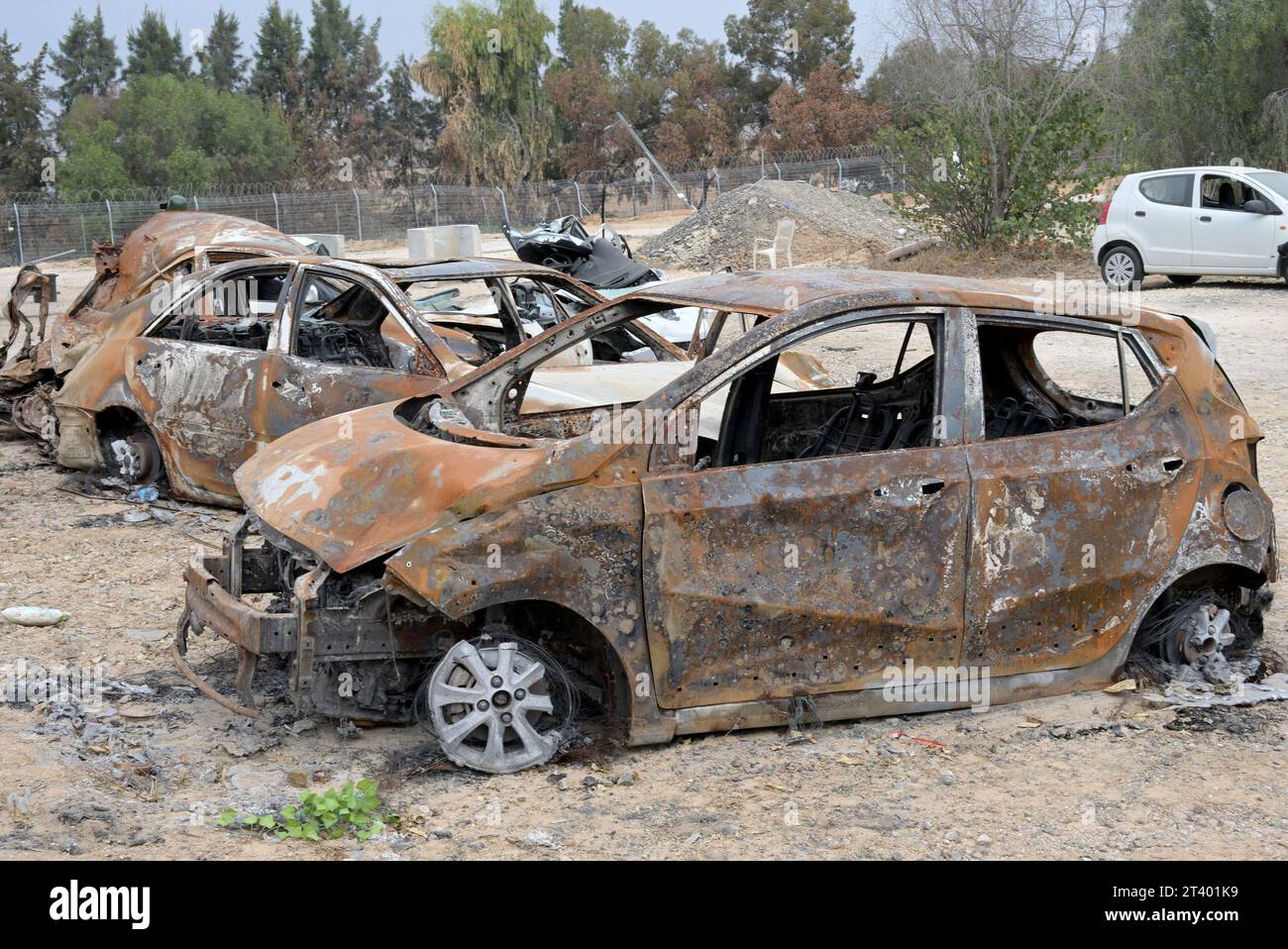 Kibbutz Kfar Aza, Israel. 27th Oct, 2023. Israeli cars that were burned ...